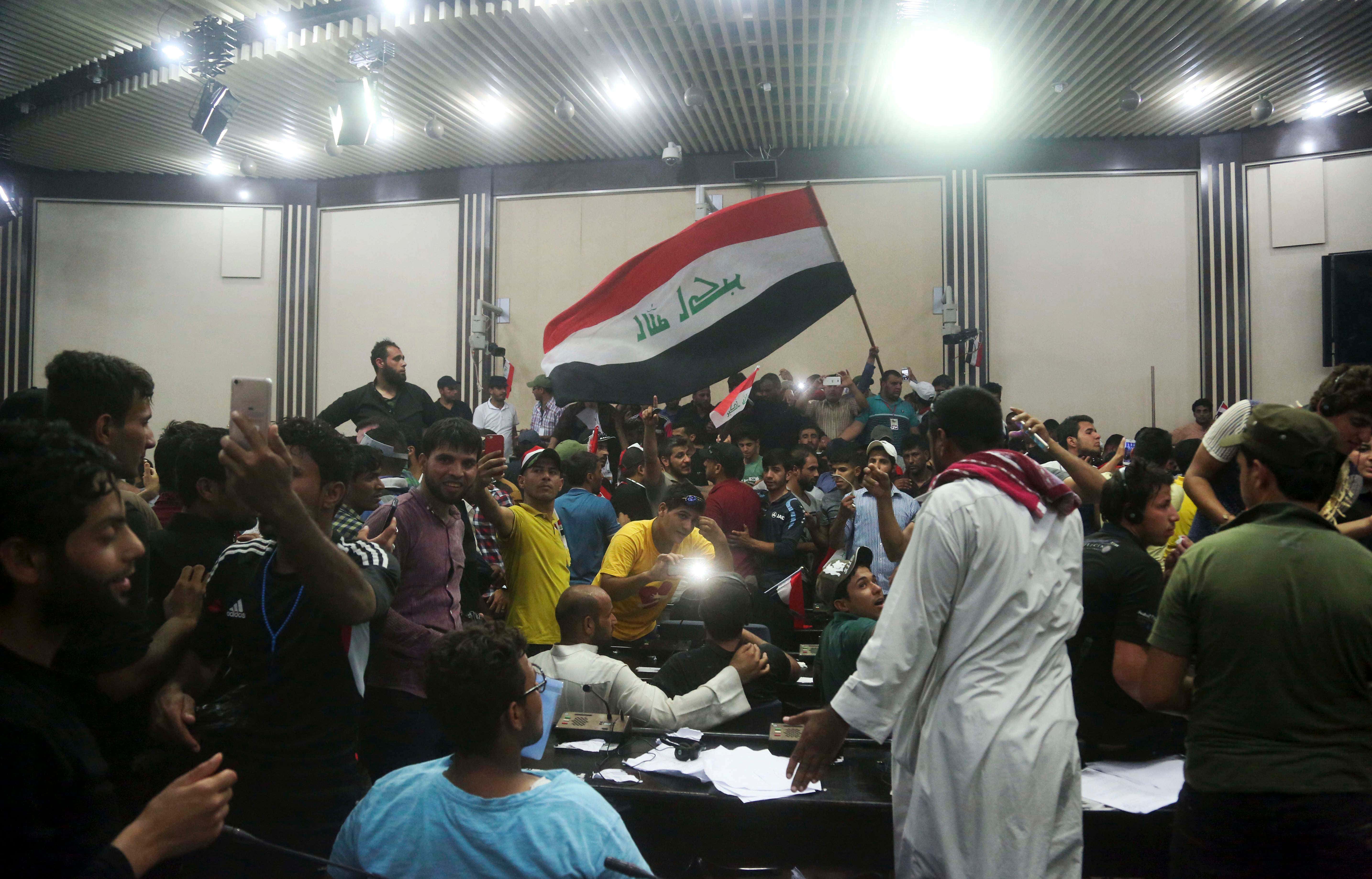 Iraqi protesters pour into heavily fortified Green Zone, storm ...