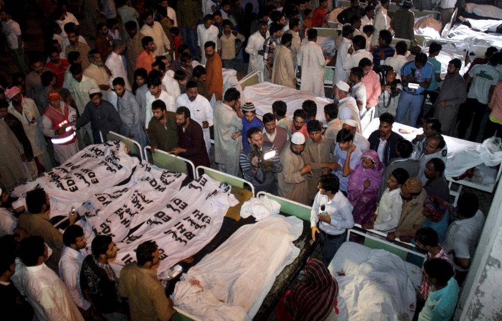 Pakistan police say bombing kills nearly 20 people near eastern border ...