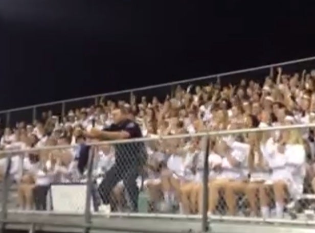 High school security officer's football game cheer goes viral | Fox News