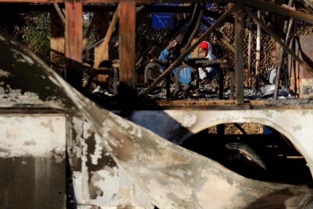 New violence erupts on outskirts of South African capital | Fox News