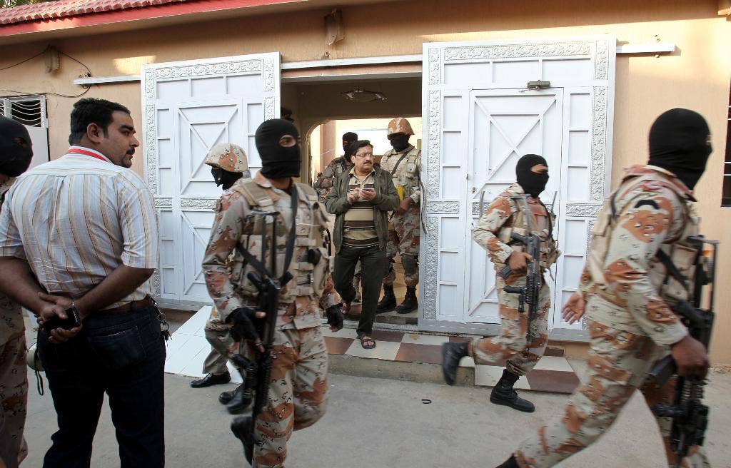 Pakistani troops raid headquarters of prominent political party in ...