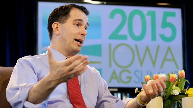 GOP rivals hit Wisconsin's Walker on changing positions on immigration ...