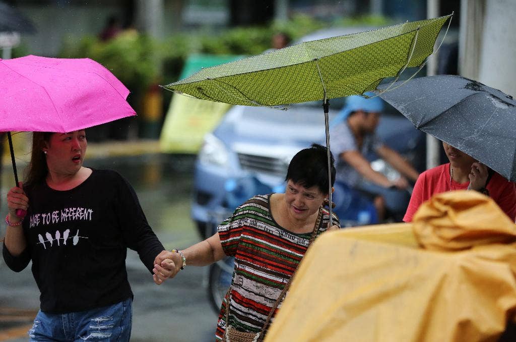 Tropical storm causes floods, knocks out power in northern Philippine ...