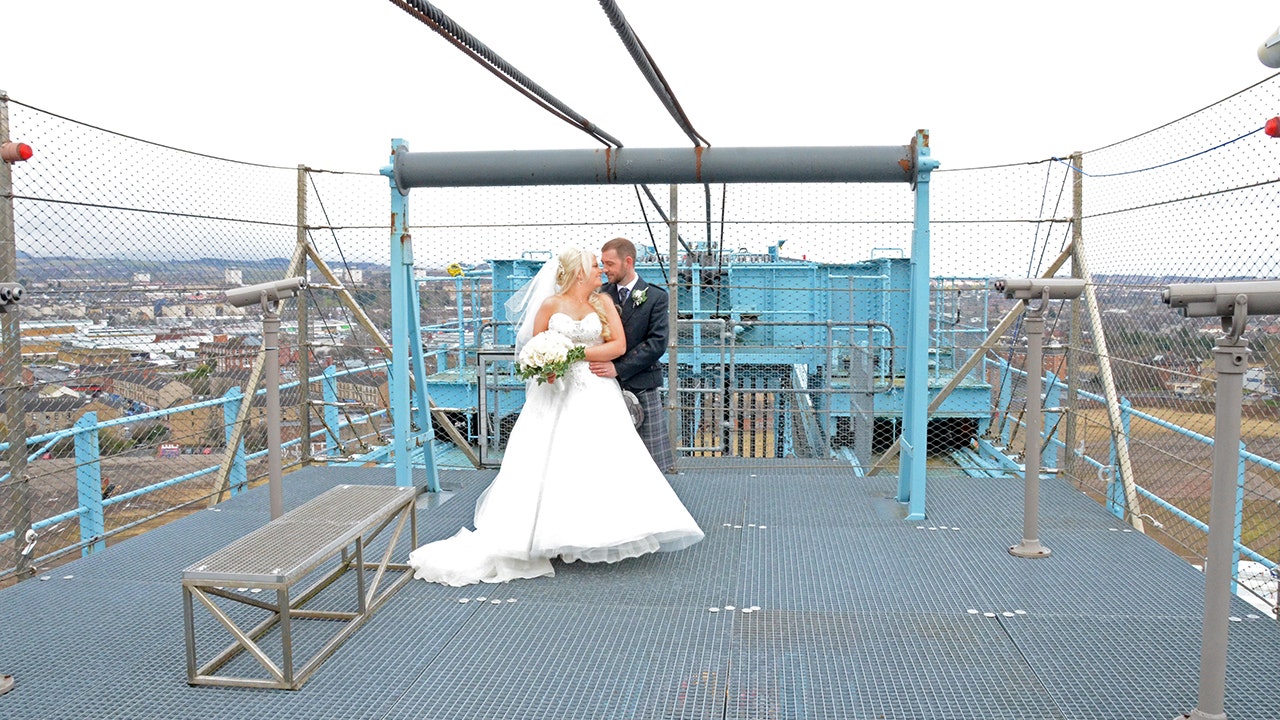Couple weds atop 150 foot crane | Fox News