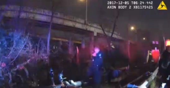 Man caught on body camera footage falling over 40-ft overpass survives ...