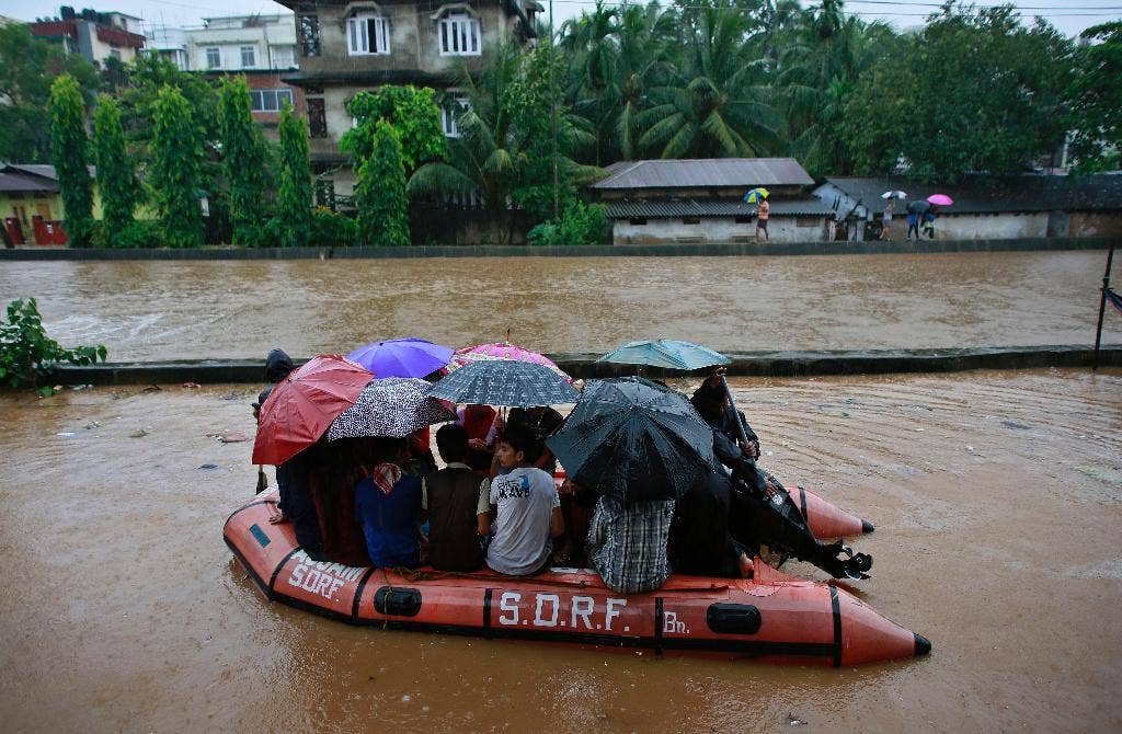 Heavy rains trigger landslides and flash floods in northeastern India ...