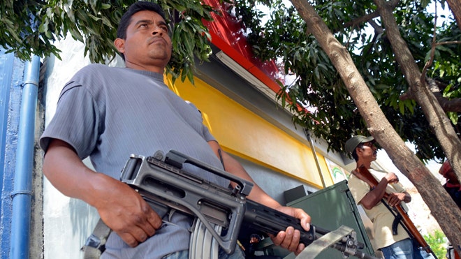 Criminals make up large part of Mexico's vigilante groups, prosecutor ...