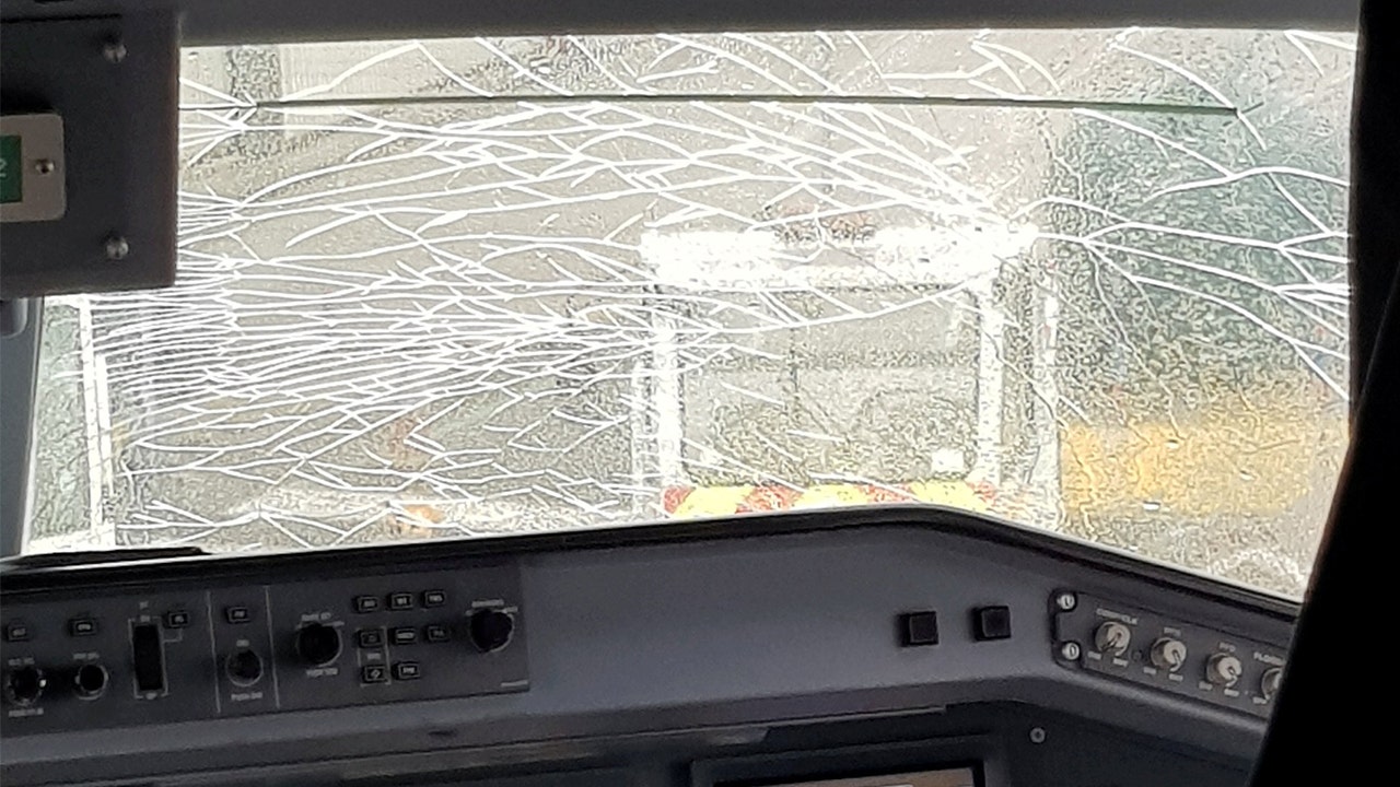 Flybe plane makes emergency landing after cockpit windshield cracks ...