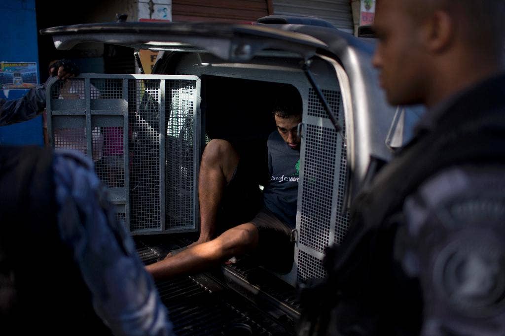 Police finish replacing Brazilian soldiers on security duty in big slum ...