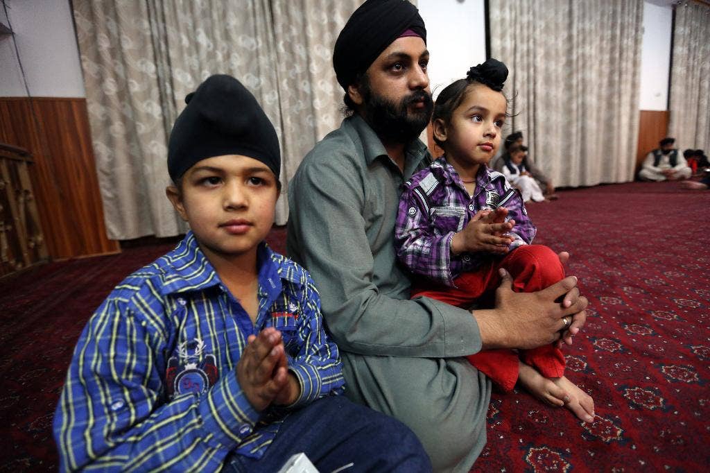 Afghan Sikhs say discrimination, persecution forcing them to leave ...