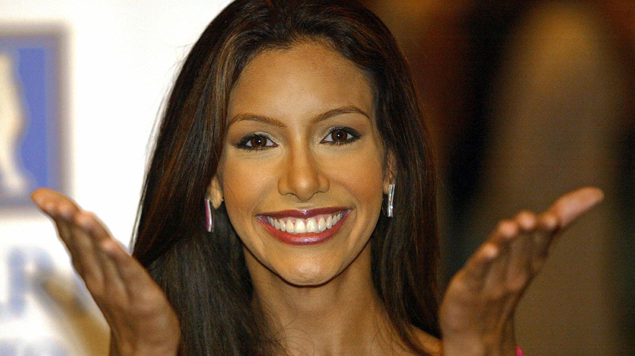 Beauty queen's mother killed by shots fired into her living room in ...