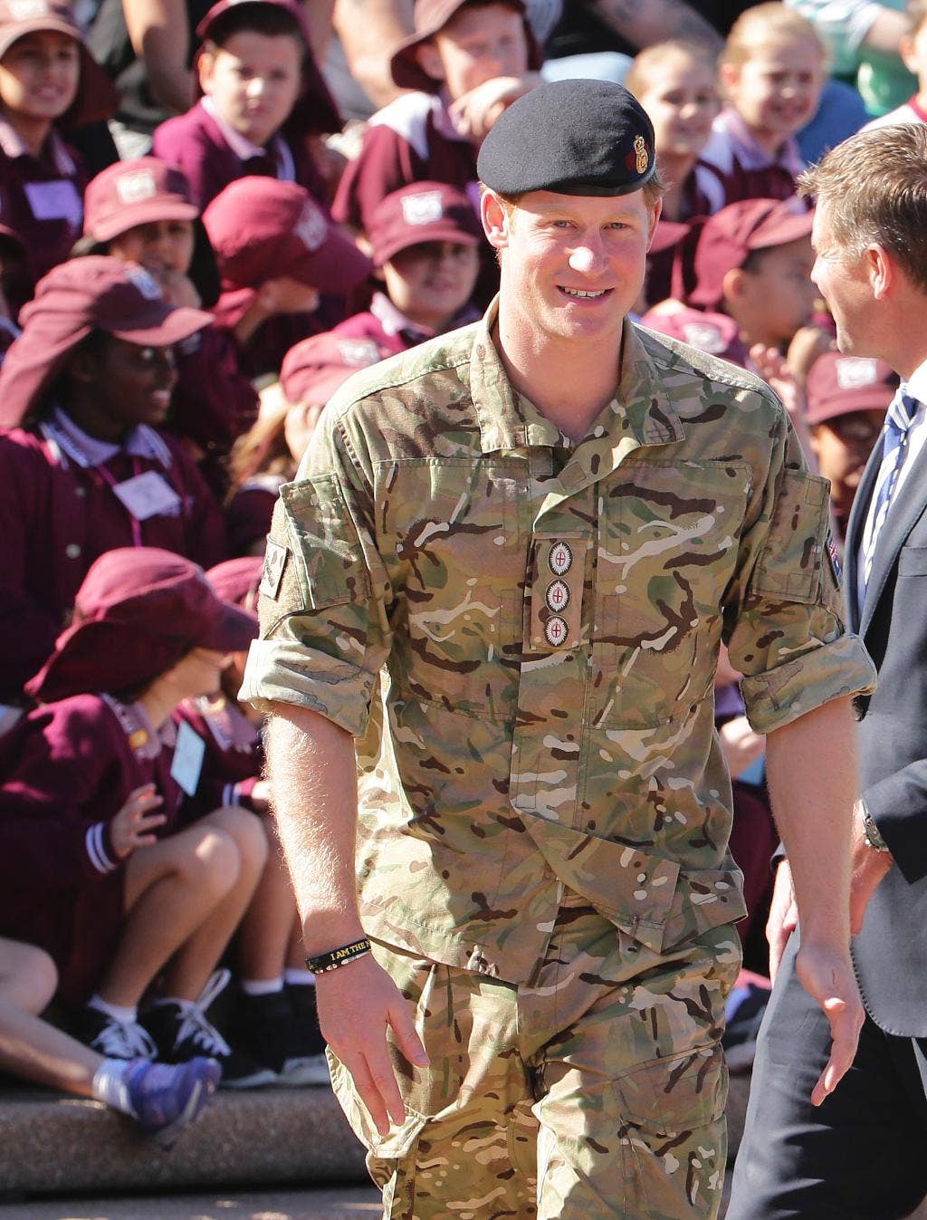 Prince Harry greets fans Down Under after finishing monthlong embedment ...