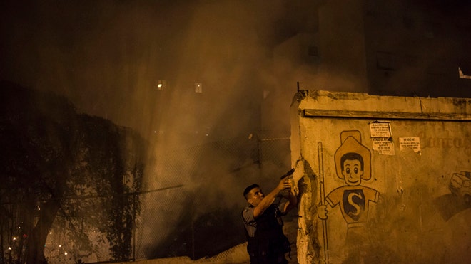 Police 'Pacification' In Rio De Janeiro Slum Explodes Into Violence ...