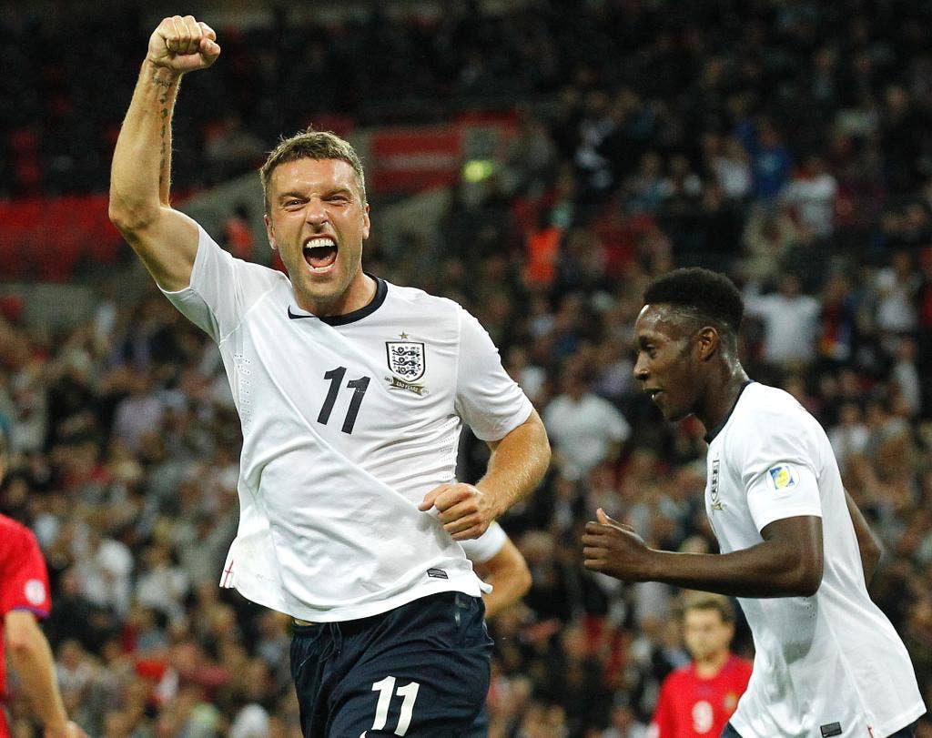 Released by Liverpool at 15, England striker Lambert completes return ...