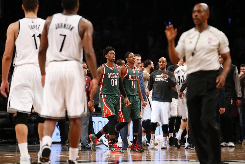 Bucks overcome Knight's stunning missed layup, beat Nets 122-118 in 3 ...