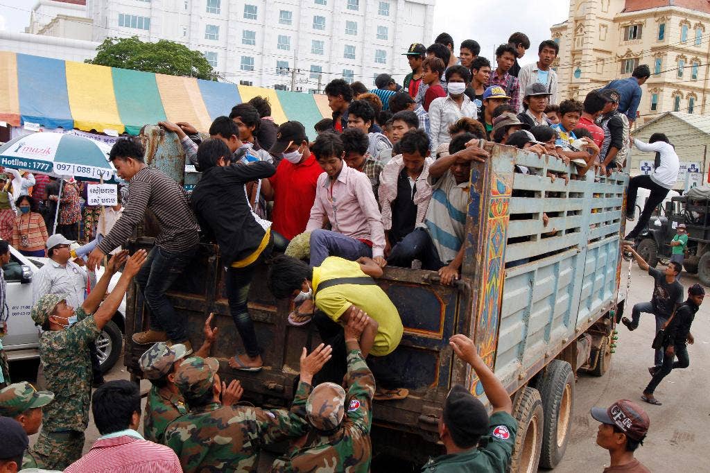 Return home is not without problems as fear drives Cambodian workers to ...