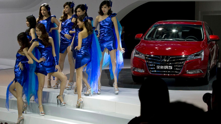Shanghai auto show bans skimpily clad female models | Fox News