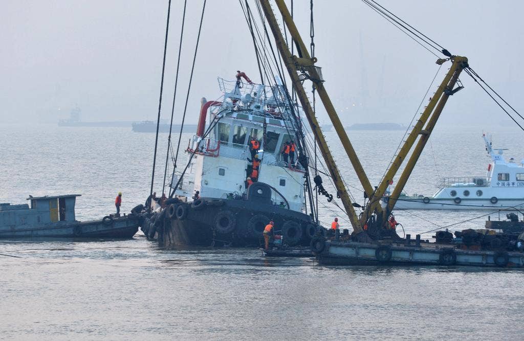 21 confirmed dead after tugboat capsizing on test voyage with ...