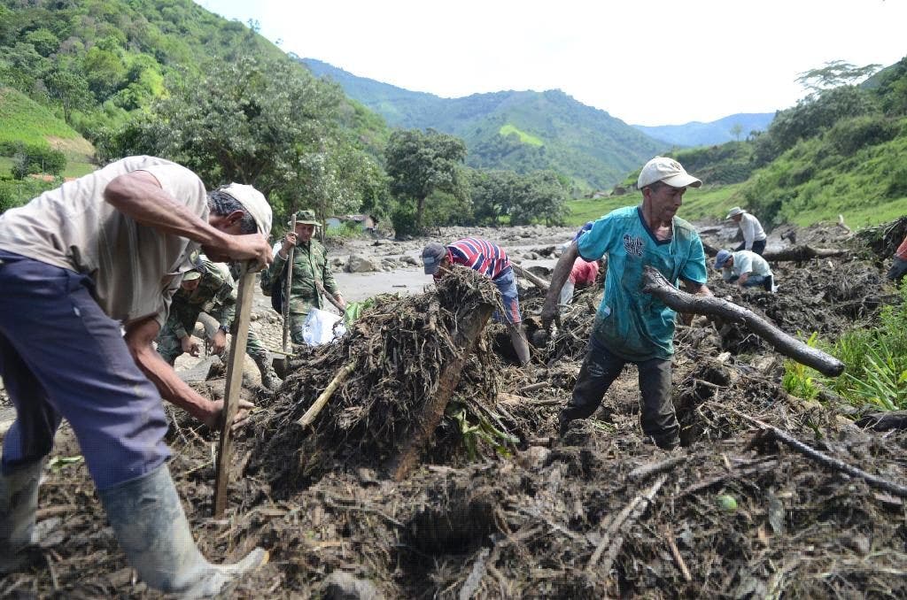 Massive flooding sweeps away homes in Colombia, killing more than a ...