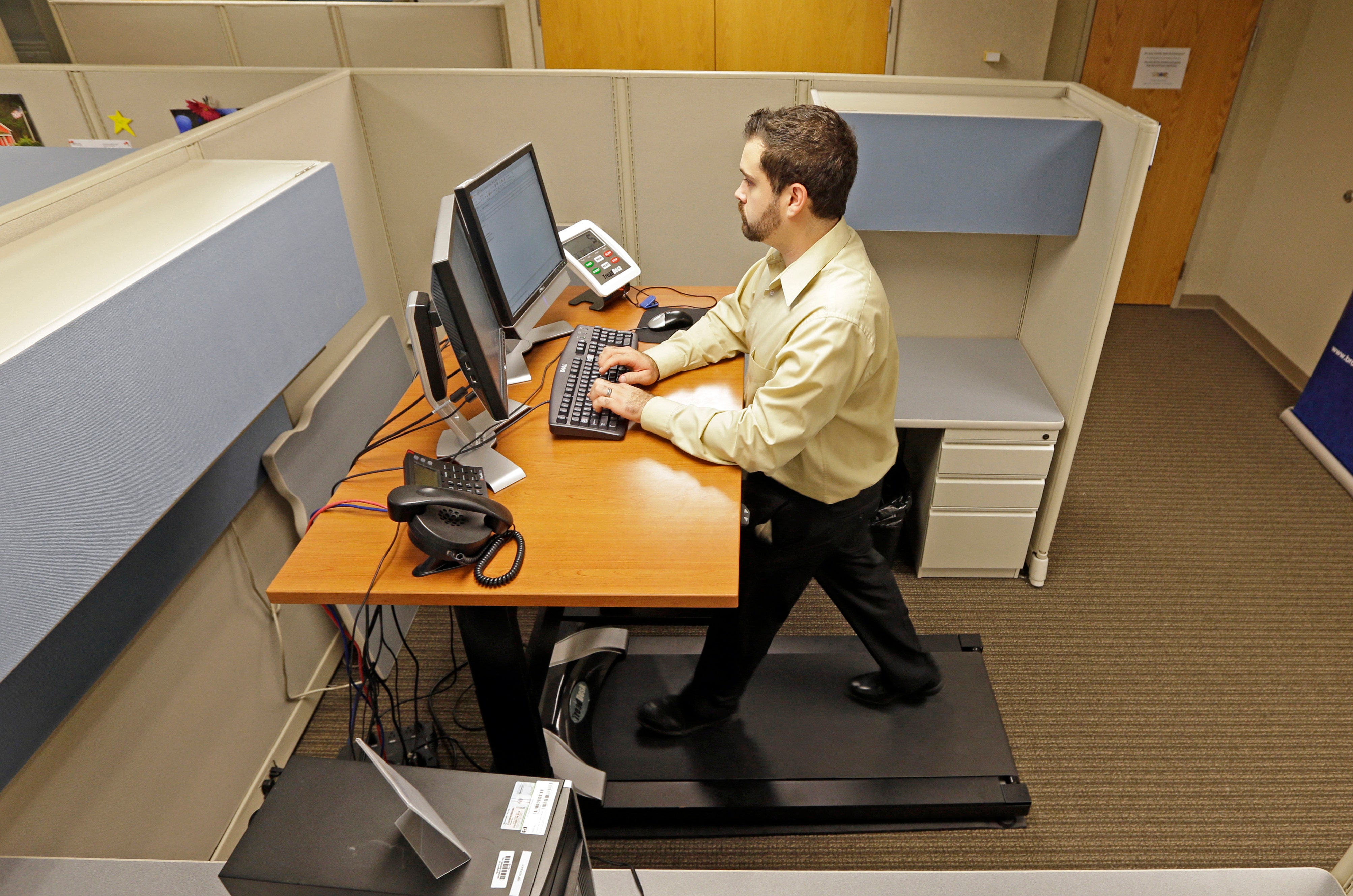 More Americans Exercising Their Way Through The Workday At Treadmill ...