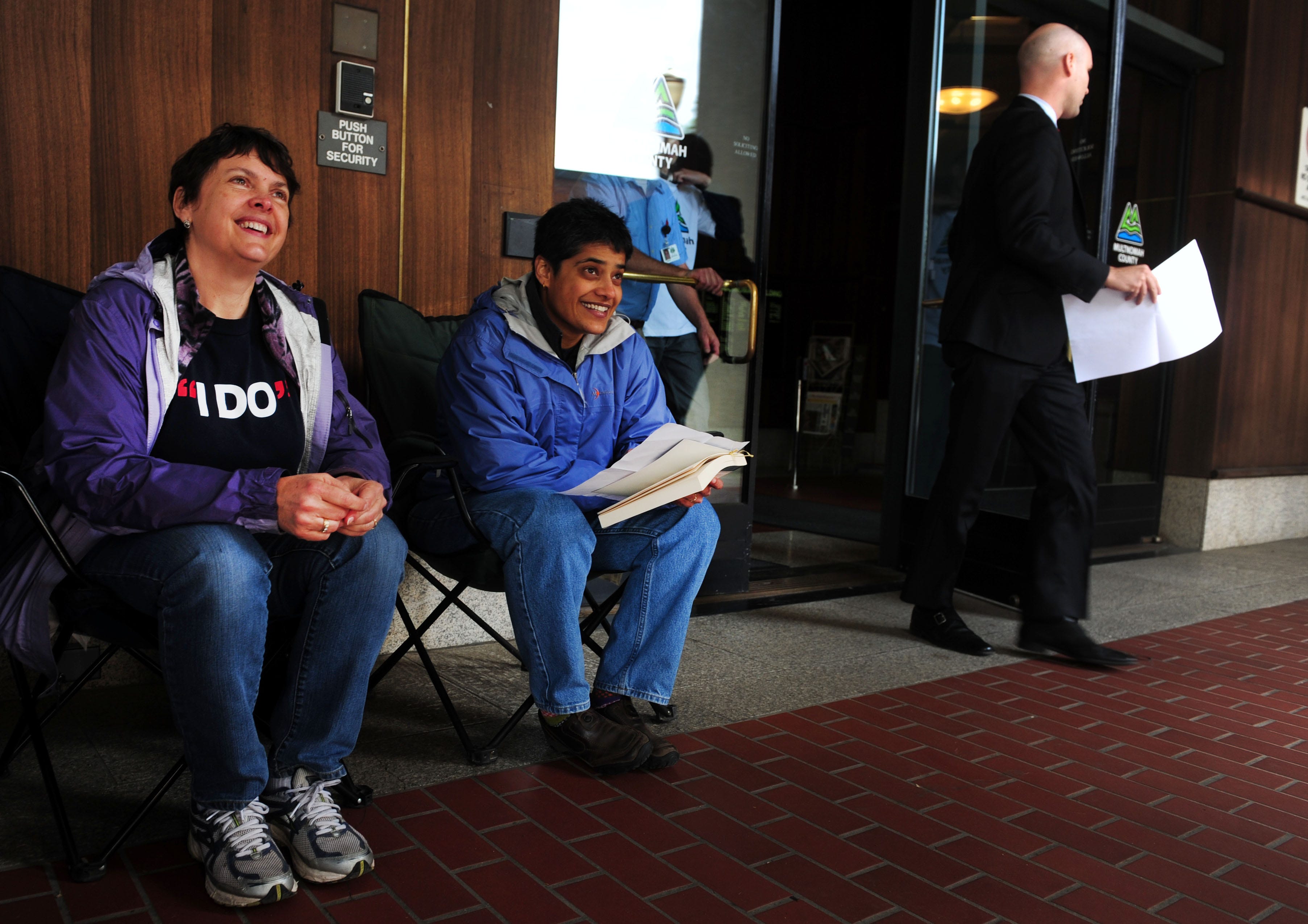 Dozens of same-sex couples marry after federal judge strikes down ...