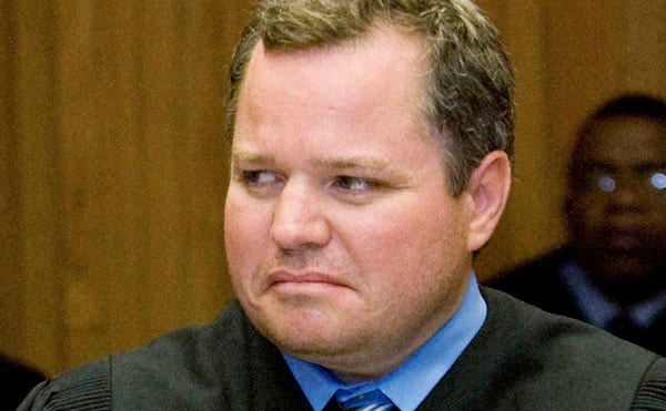 Illinois judge resigns after being charged with heroin and gun offenses ...