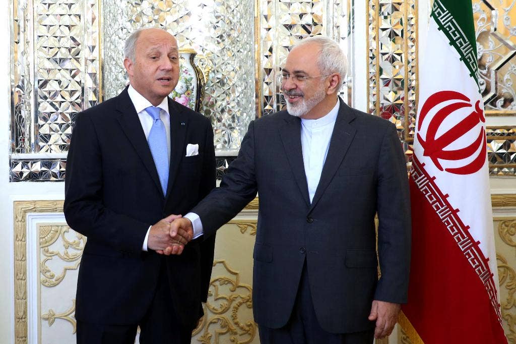 Iran, France talk of 'new era' in relations after historic nuclear deal ...