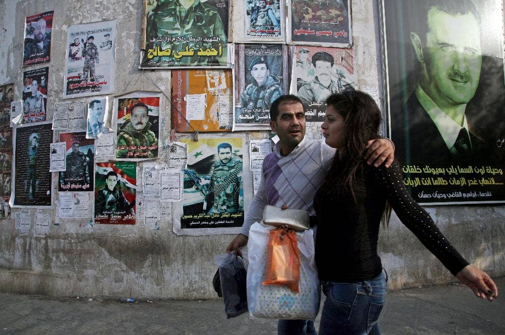 Syria's Alawites pay heavy price for war as they bury their sons, Assad ...