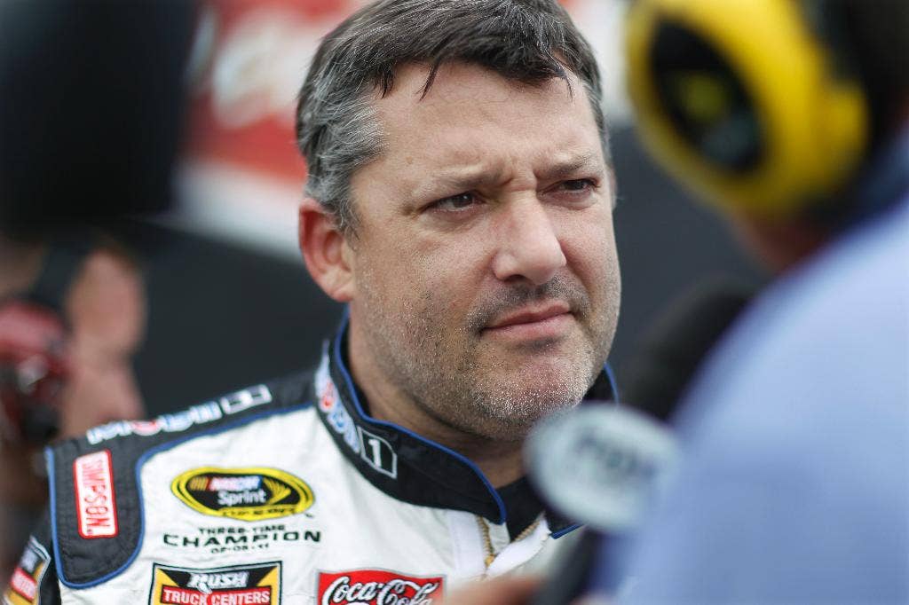 Gone fishing: Tony Stewart trying to catch fish and a big victory ...