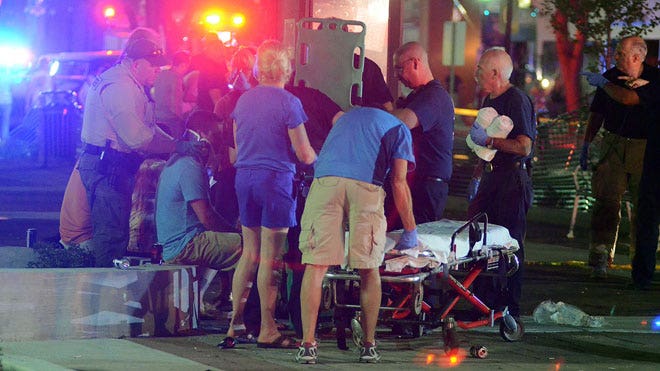 Bystanders lift car to free victims after Ohio woman mows down crowd ...