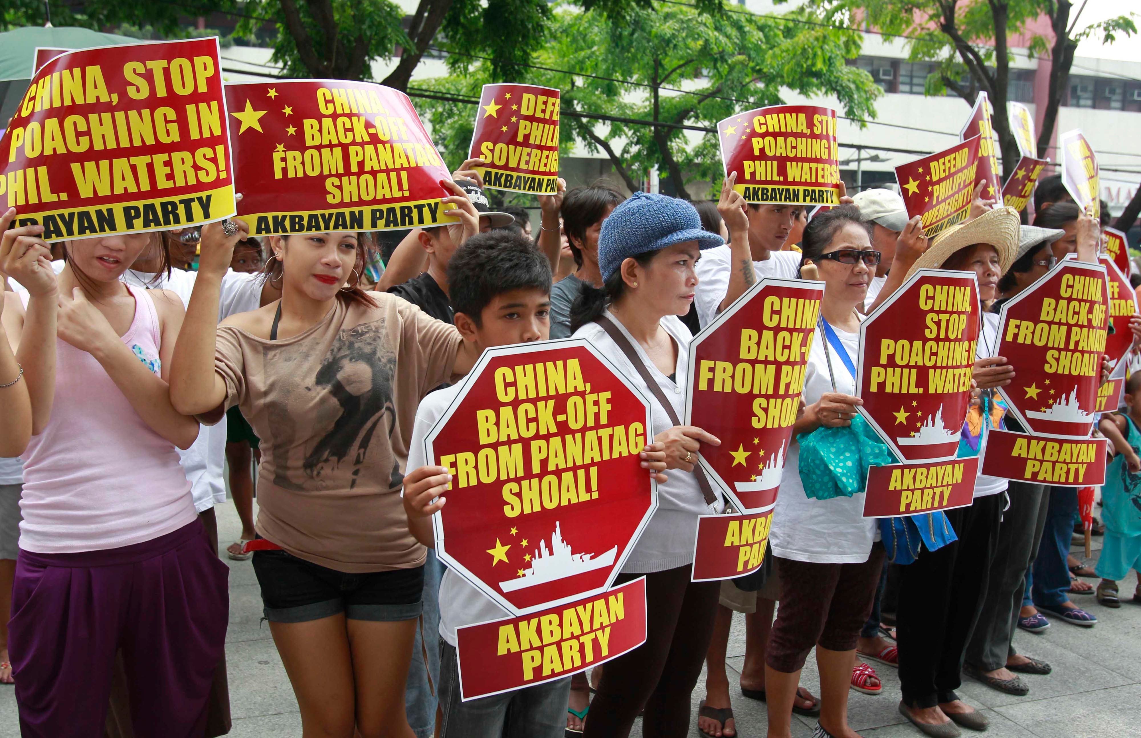 Philippines scales back ships in disputed territory, says it won't risk ...