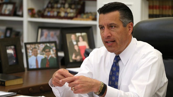 Brian Sandoval surprises party and proposes biggest tax hike in Nevada ...