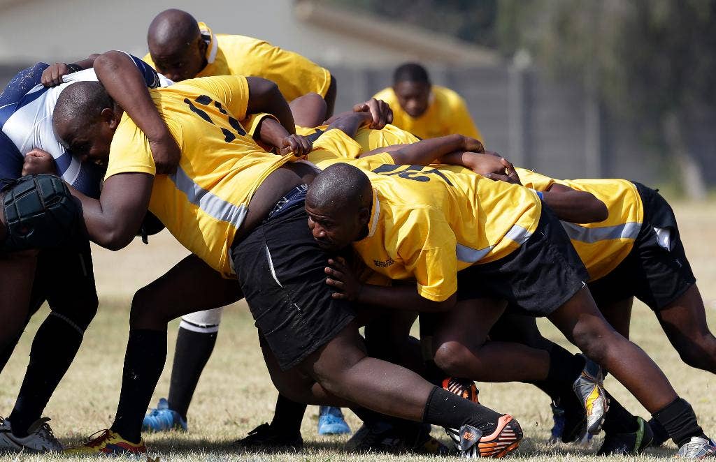An amateur South African rugby team with little but determination plays ...