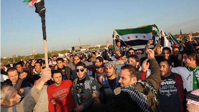 Protesters attack 7 Syrian embassies around world in wake of bloody ...