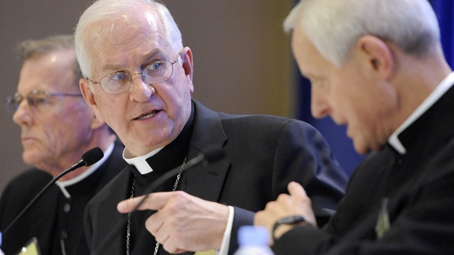 U.S. bishops gathered in Baltimore project unity over distance from ...