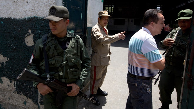 Jailed opposition leader wins in Venezuelan primary, anti-Chavez ...