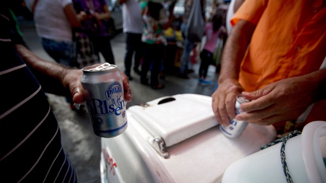 Shortages leave Venezuelans thirsty for their favorite beer amid heat ...