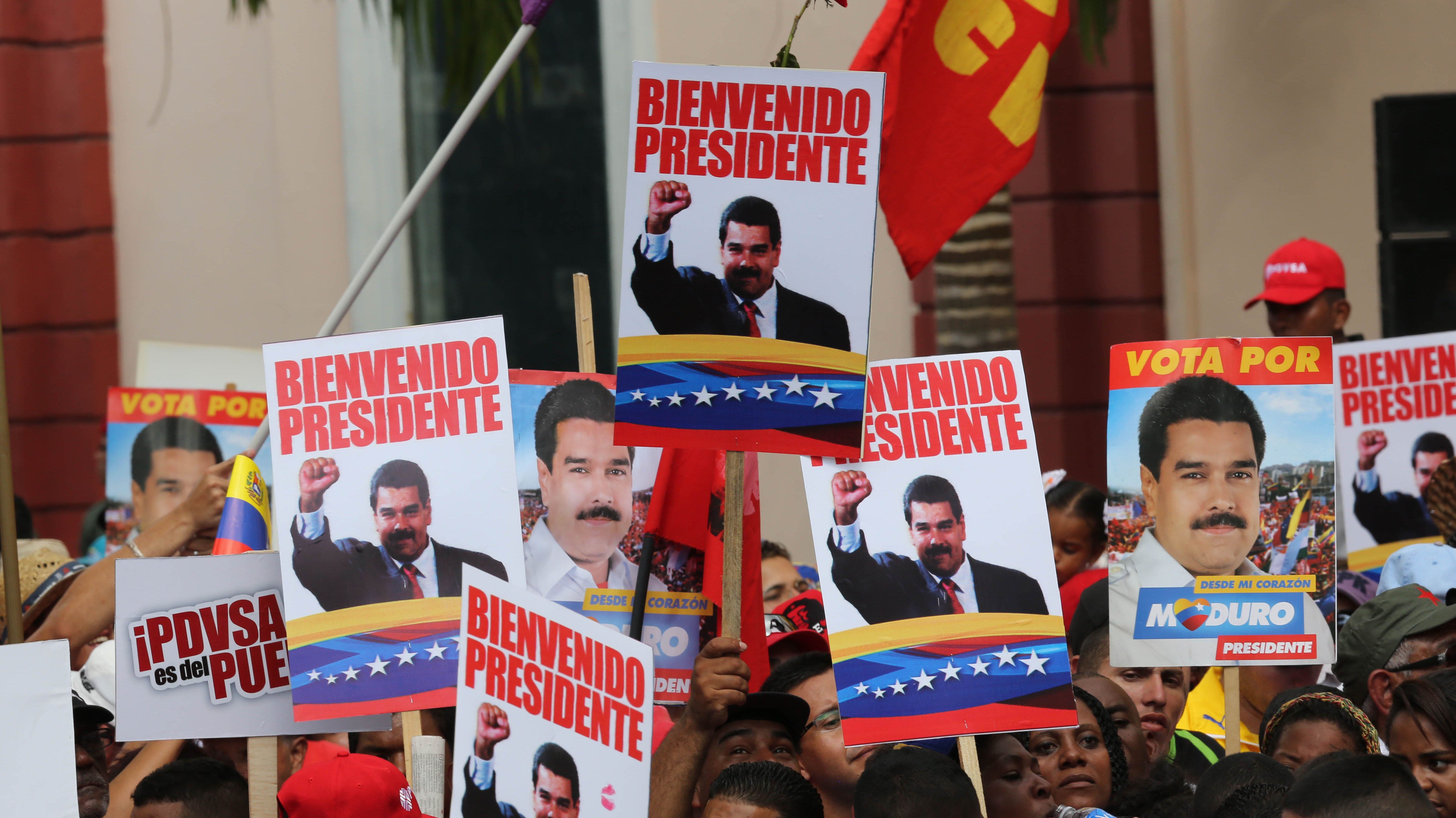 Venezuela's Maduro gets ticker tape parade amid looming political ...