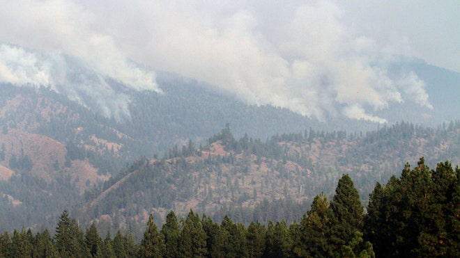 Firefighters battle Washington state wildfire that has burned 20,000 ...