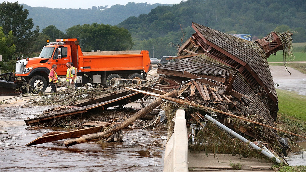 Wisconsin drenched by flash floods as crews recover body of man swept ...