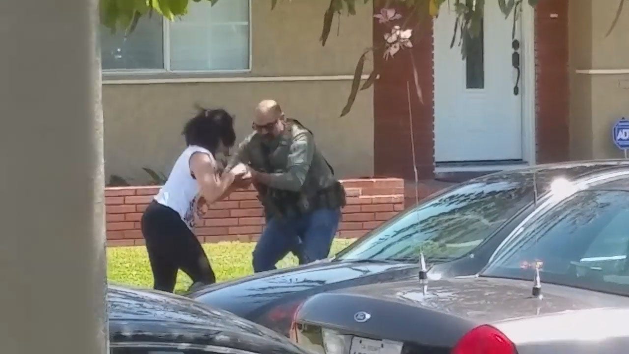 Anger over U.S. Marshal who attacked woman taping at police scene ...