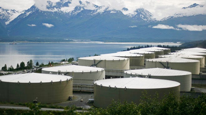 Drop in oil prices rocks producer states, triggers historic tax hike ...