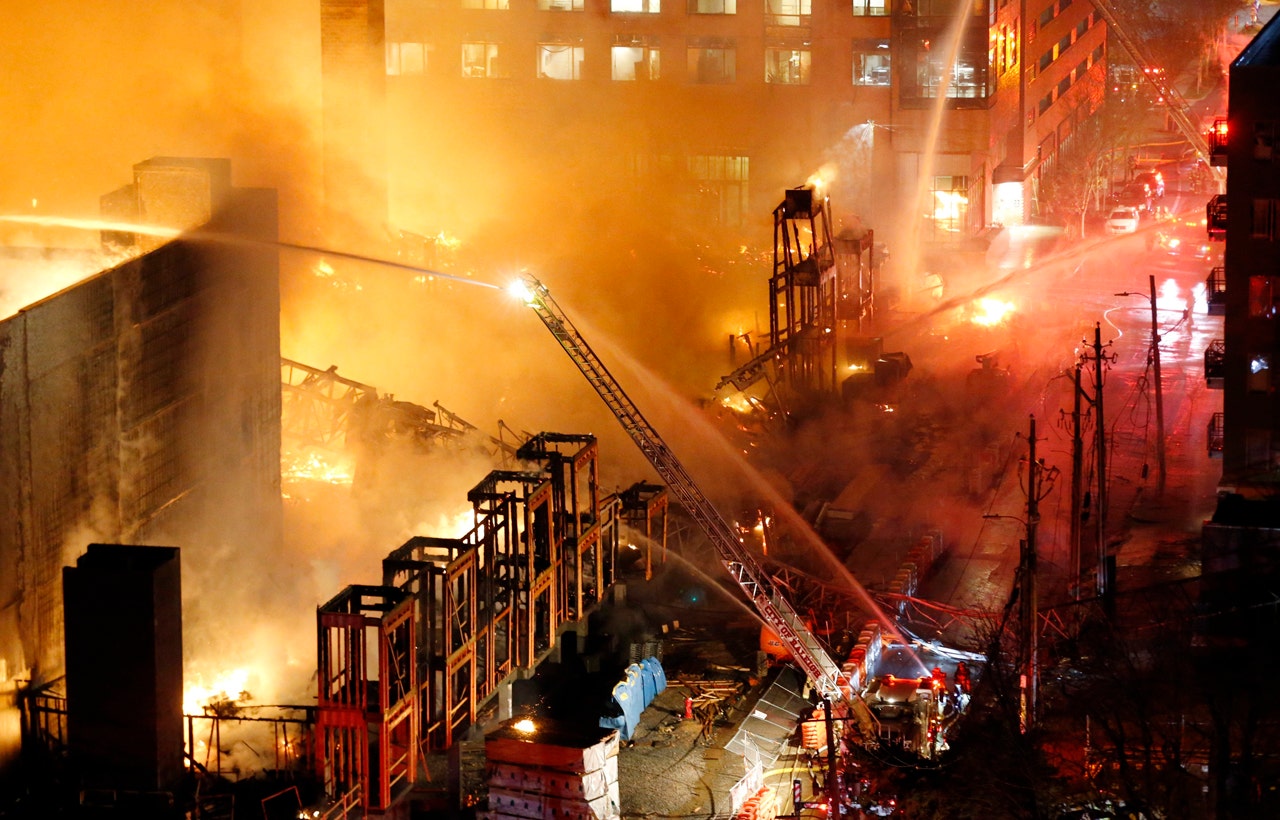 Massive fire engulfs Raleigh apartment building under construction ...