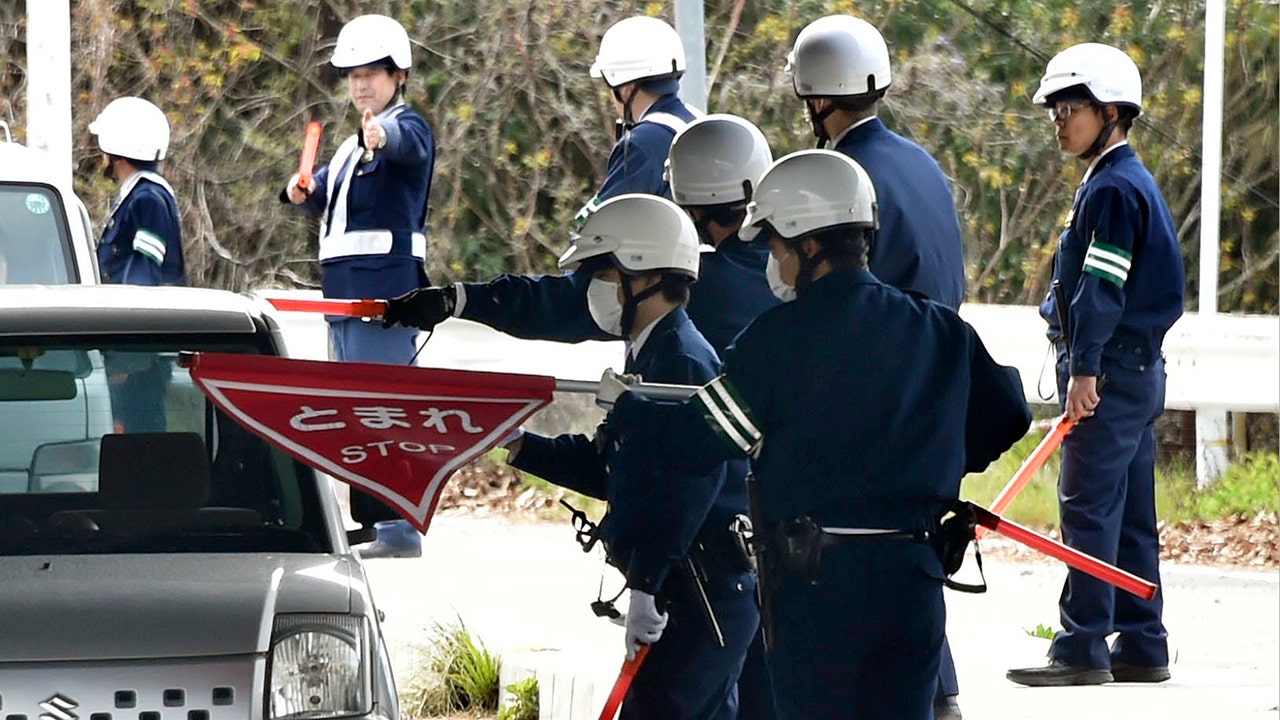 Hundreds of Japanese police converge on tiny island in manhunt for ...