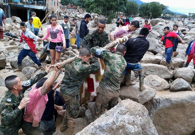 Colombia flood: Over 200 dead after rivers overflow, toppling homes ...
