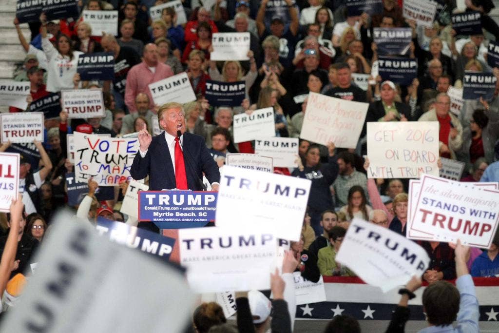 Trump called out for appearing to mock reporter with disability, denies ...