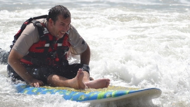 Paralyzed Florida man surfing again | Fox News