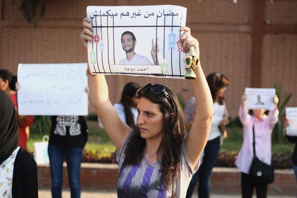 Women rally outside of Egypt's presidential palace over thousands ...