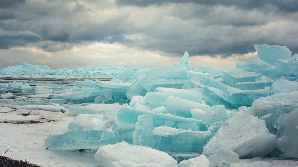 Rare blue ice stacks 'as high as a three-story building' form along ...