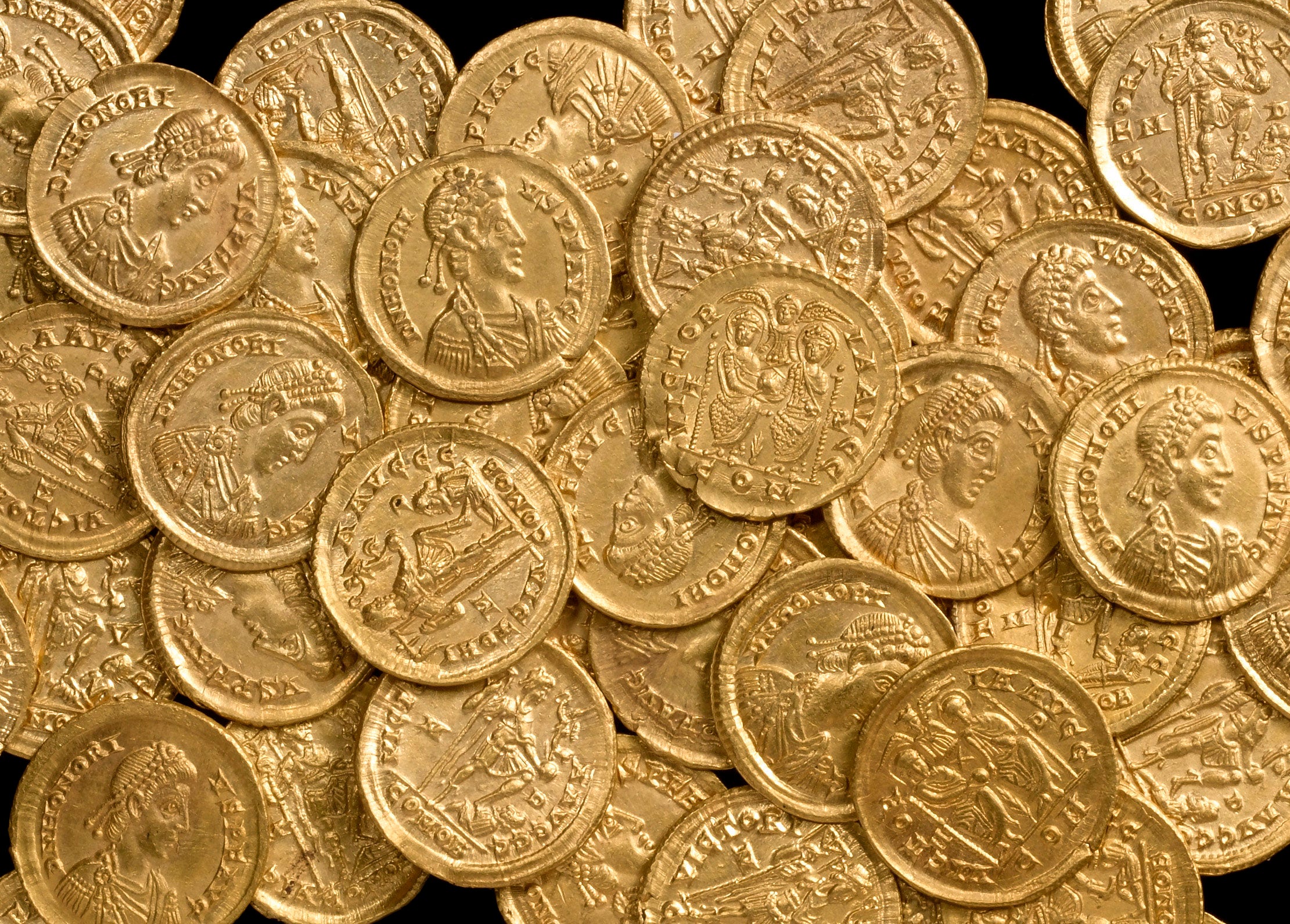 English city to show off gold Roman coins found with metal detector ...
